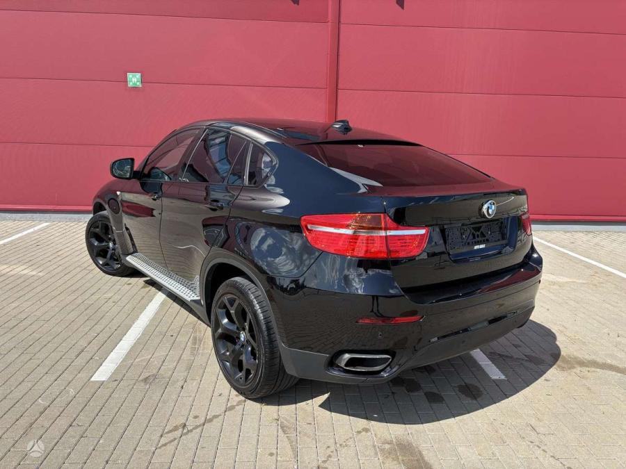 Black BMW X6 2012 in Kaunas, with an engine capacity of 3.00 L and mileage of 312 thousand km for 12750 €, photo 4 on AUTOMOTO.COM.LV