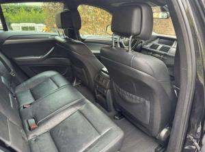 Black BMW X6 2012 in Kaunas, with an engine capacity of 3.00 L and mileage of 312 thousand km for 12750 €, photo 12 on AUTOMOTO.COM.LV