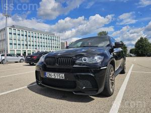 Black BMW X6 2012 in Riga, with an engine capacity of 3.00 L and mileage of 200 thousand km for 12900 €, photo  on AUTOMOTO.COM.LV