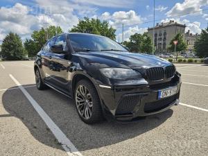 Black BMW X6 2012 in Riga, with an engine capacity of 3.00 L and mileage of 200 thousand km for 12900 €, photo 3 on AUTOMOTO.COM.LV