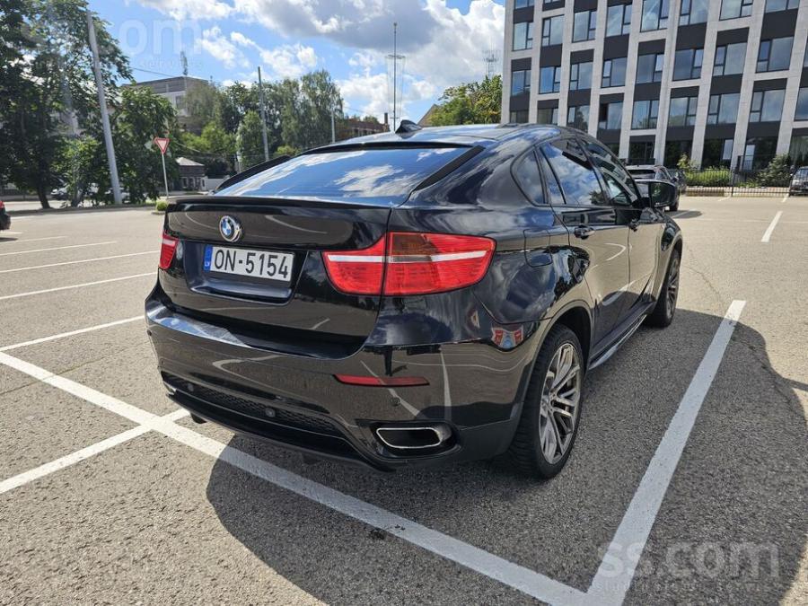 Black BMW X6 2012 in Riga, with an engine capacity of 3.00 L and mileage of 200 thousand km for 12900 €, photo 4 on AUTOMOTO.COM.LV
