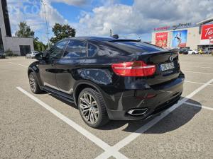 Black BMW X6 2012 in Riga, with an engine capacity of 3.00 L and mileage of 200 thousand km for 12900 €, photo 5 on AUTOMOTO.COM.LV
