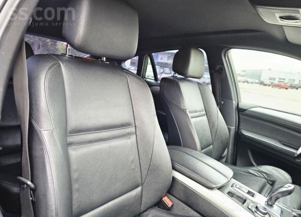 Black BMW X6 2012 in Riga, with an engine capacity of 3.00 L and mileage of 200 thousand km for 12900 €, photo 9 on AUTOMOTO.COM.LV