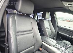 Black BMW X6 2012 in Riga, with an engine capacity of 3.00 L and mileage of 200 thousand km for 12900 €, photo 10 on AUTOMOTO.COM.LV