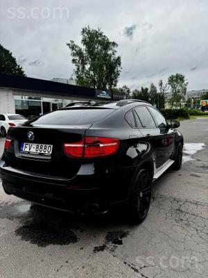 Black BMW X6 2012 in Riga, with an engine capacity of 3.00 L and mileage of 340 thousand km for 12800 €, photo 4 on AUTOMOTO.COM.LV