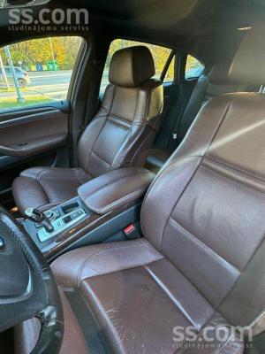 Black BMW X6 2012 in Riga, with an engine capacity of 3.00 L and mileage of 340 thousand km for 12800 €, photo 9 on AUTOMOTO.COM.LV