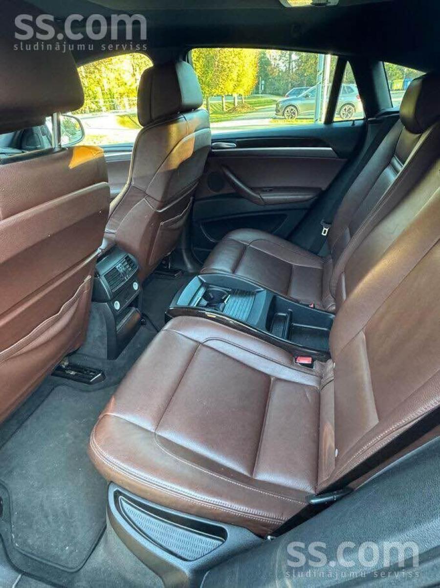 Black BMW X6 2012 in Riga, with an engine capacity of 3.00 L and mileage of 340 thousand km for 12800 €, photo 11 on AUTOMOTO.COM.LV