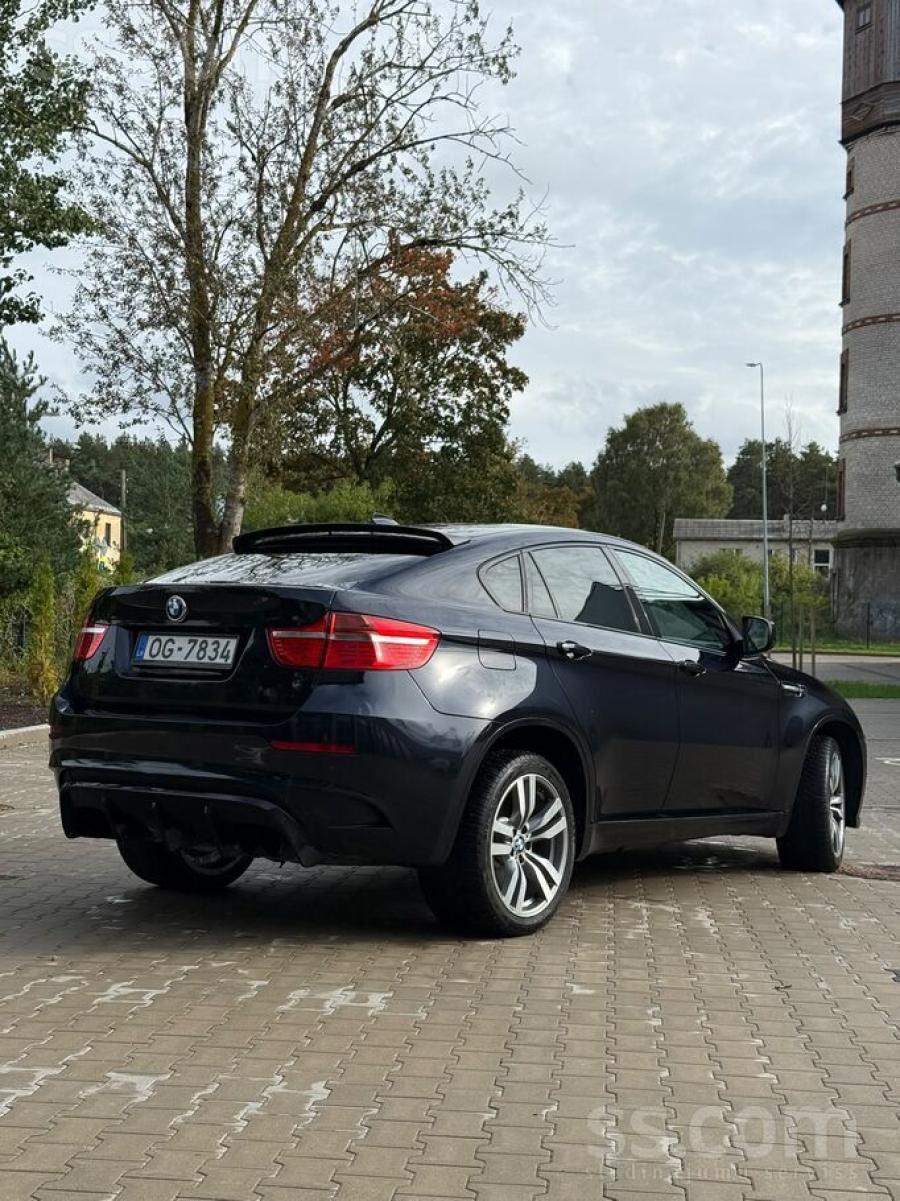 Black BMW X6 2012 in Riga, with an engine capacity of 4.40 L and mileage of 223 thousand km for 14200 €, photo 4 on AUTOMOTO.COM.LV