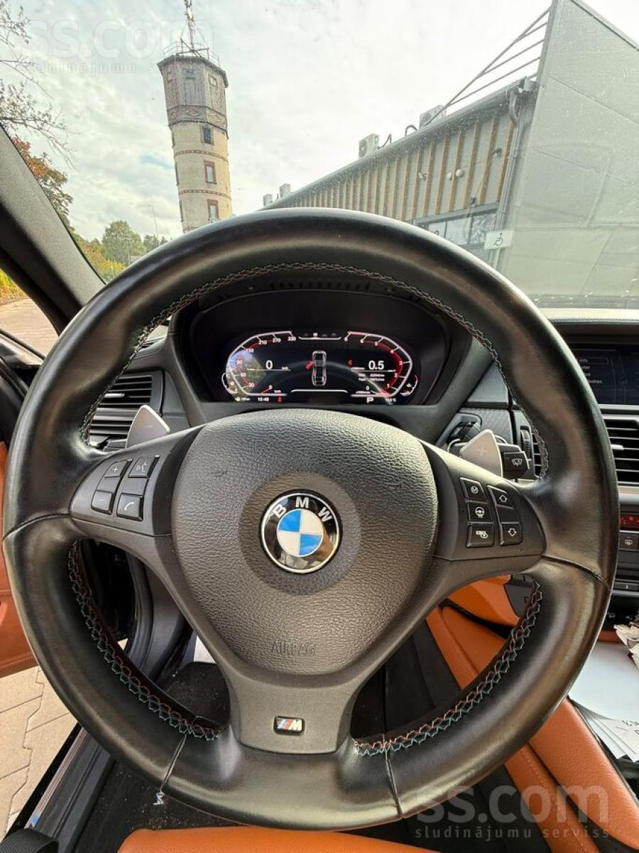 Black BMW X6 2012 in Riga, with an engine capacity of 4.40 L and mileage of 223 thousand km for 14200 €, photo 13 on AUTOMOTO.COM.LV