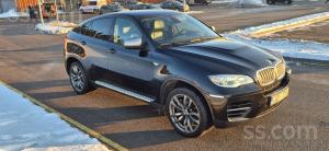 Black BMW X6 2013 in Riga, with an engine capacity of 3.00 L and mileage of 212 thousand km for 17500 €, photo  on AUTOMOTO.COM.LV