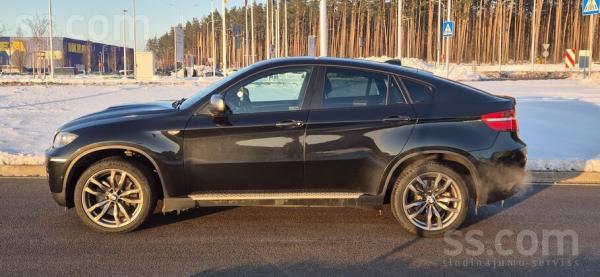 Black BMW X6 2013 in Riga, with an engine capacity of 3.00 L and mileage of 212 thousand km for 17500 €, photo 2 on AUTOMOTO.COM.LV
