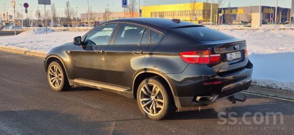 Black BMW X6 2013 in Riga, with an engine capacity of 3.00 L and mileage of 212 thousand km for 17500 €, photo 3 on AUTOMOTO.COM.LV