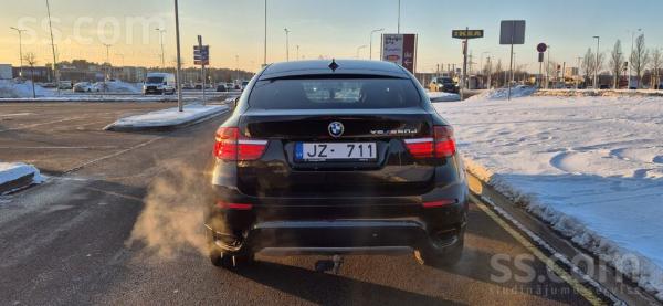 Black BMW X6 2013 in Riga, with an engine capacity of 3.00 L and mileage of 212 thousand km for 17500 €, photo 4 on AUTOMOTO.COM.LV