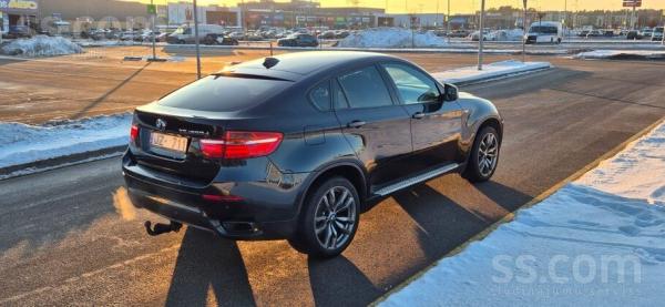 Black BMW X6 2013 in Riga, with an engine capacity of 3.00 L and mileage of 212 thousand km for 17500 €, photo 5 on AUTOMOTO.COM.LV