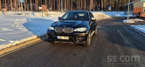 Black BMW X6 2013 in Riga, with an engine capacity of 3.00 L and mileage of 212 thousand km for 17500 €, photo 6 on AUTOMOTO.COM.LV
