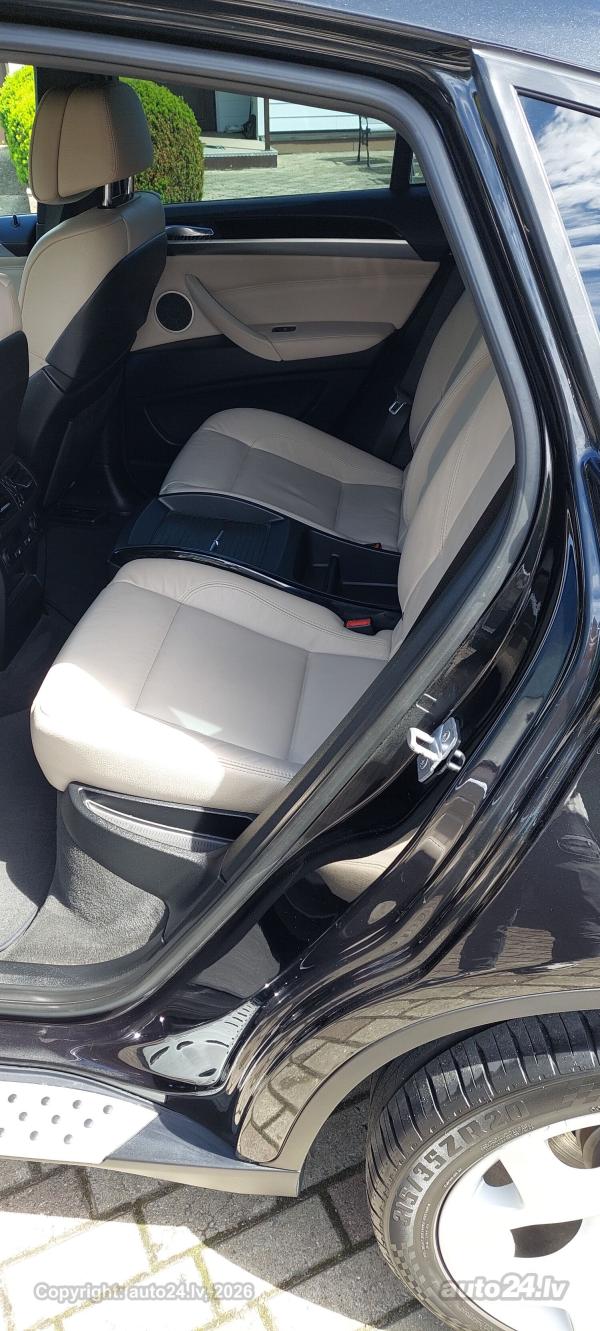 Black BMW X6 2013 in Keila, with an engine capacity of 3.00 L and mileage of 182 thousand km for 18500 €, photo 5 on AUTOMOTO.COM.LV