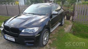 Black BMW X6 2013 in Kuldiga, with an engine capacity of 3.00 L and mileage of 0 thousand km for 15500 €, photo 4 on AUTOMOTO.COM.LV