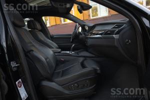 Black BMW X6 2013 in Jelgava, with an engine capacity of 3.00 L and mileage of 228 thousand km for 17600 €, photo 7 on AUTOMOTO.COM.LV