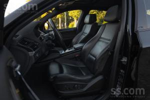 Black BMW X6 2013 in Jelgava, with an engine capacity of 3.00 L and mileage of 228 thousand km for 17600 €, photo 17 on AUTOMOTO.COM.LV