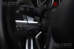 Black BMW X6 2013 in Jelgava, with an engine capacity of 3.00 L and mileage of 228 thousand km for 17600 €, photo 21 on AUTOMOTO.COM.LV