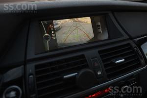 Black BMW X6 2013 in Jelgava, with an engine capacity of 3.00 L and mileage of 228 thousand km for 17600 €, photo 23 on AUTOMOTO.COM.LV