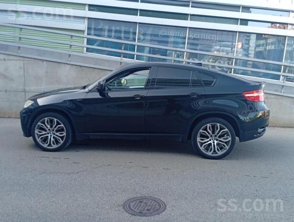 Black BMW X6 2013 in Riga, with an engine capacity of 3.00 L and mileage of 0 thousand km for 13000 €, photo 7 on AUTOMOTO.COM.LV