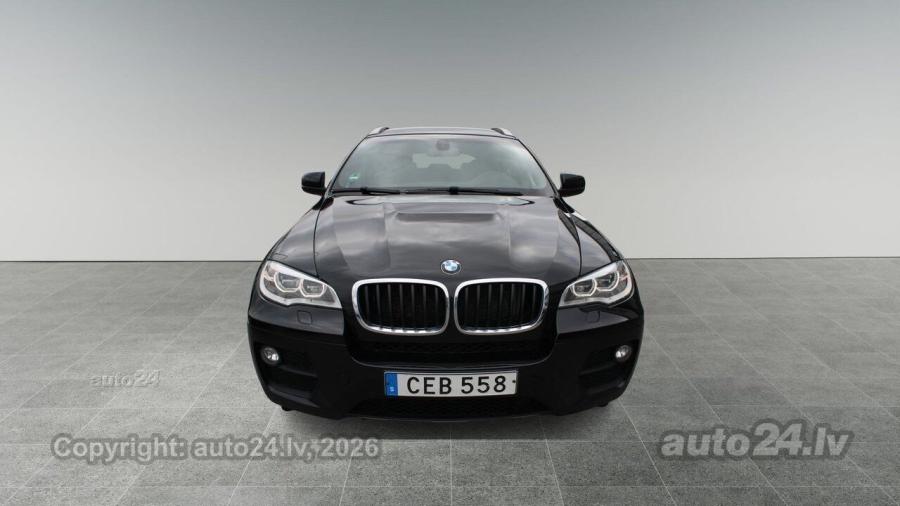 Black BMW X6 2014 in Parnu, with an engine capacity of 3.00 L and mileage of 201 thousand km for 18500 €, photo 14 on AUTOMOTO.COM.LV