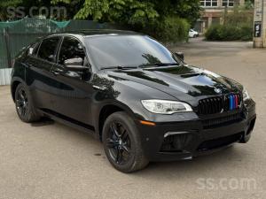 Black BMW X6 2014 in Riga, with an engine capacity of 4.40 L and mileage of 155 thousand km for 10890 €, photo 10 on AUTOMOTO.COM.LV
