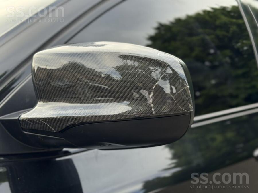 Black BMW X6 2014 in Riga, with an engine capacity of 4.40 L and mileage of 155 thousand km for 10890 €, photo 12 on AUTOMOTO.COM.LV