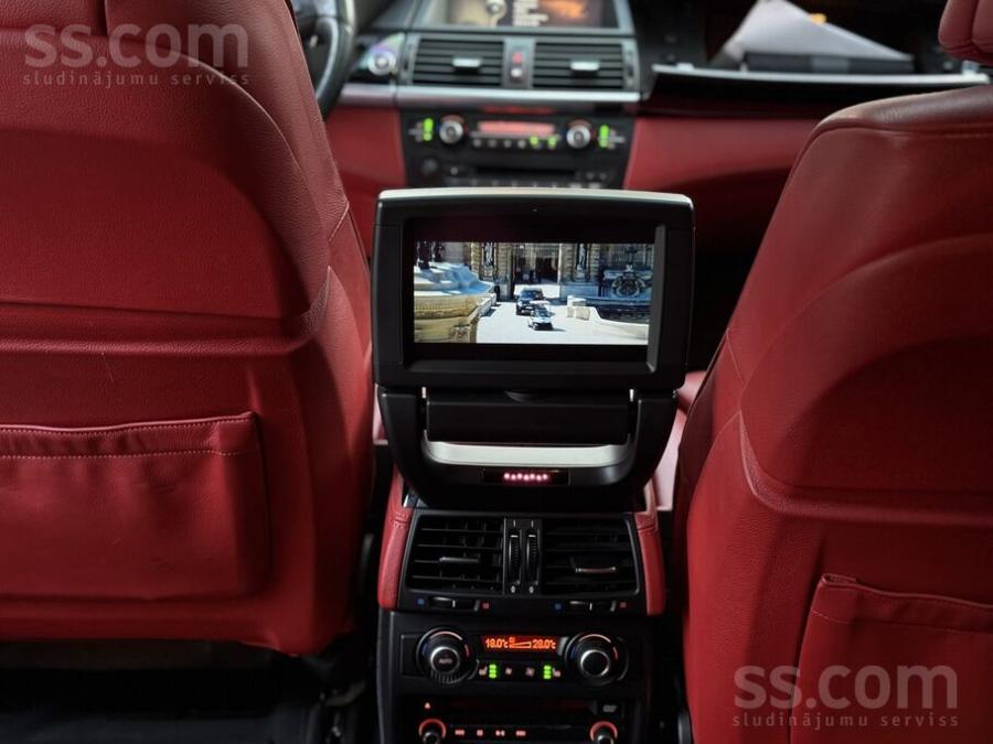 Black BMW X6 2014 in Riga, with an engine capacity of 4.40 L and mileage of 155 thousand km for 10890 €, photo 30 on AUTOMOTO.COM.LV