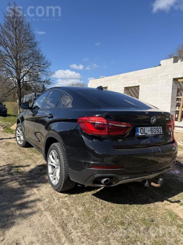 Black BMW X6 2014 in Ogre, with an engine capacity of 3.00 L and mileage of 283 thousand km for 18000 €, photo 3 on AUTOMOTO.COM.LV
