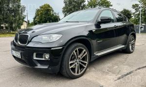 Black BMW X6 2014 in Riga, with an engine capacity of 3.00 L and mileage of 198 thousand km for 13500 €, photo 1 on AUTOMOTO.COM.LV