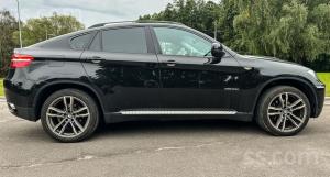 Black BMW X6 2014 in Riga, with an engine capacity of 3.00 L and mileage of 198 thousand km for 13500 €, photo 4 on AUTOMOTO.COM.LV