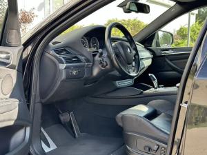 Black BMW X6 2014 in Riga, with an engine capacity of 3.00 L and mileage of 256 thousand km for 17300 €, photo 8 on AUTOMOTO.COM.LV