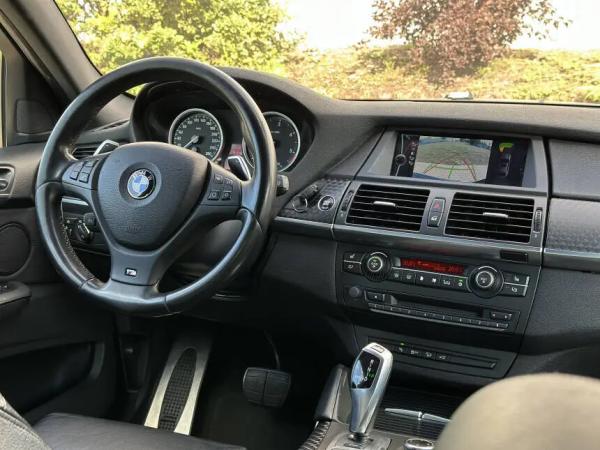 Black BMW X6 2014 in Riga, with an engine capacity of 3.00 L and mileage of 256 thousand km for 17300 €, photo 10 on AUTOMOTO.COM.LV