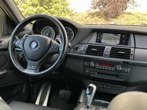 Black BMW X6 2014 in Riga, with an engine capacity of 3.00 L and mileage of 256 thousand km for 17300 €, photo 11 on AUTOMOTO.COM.LV