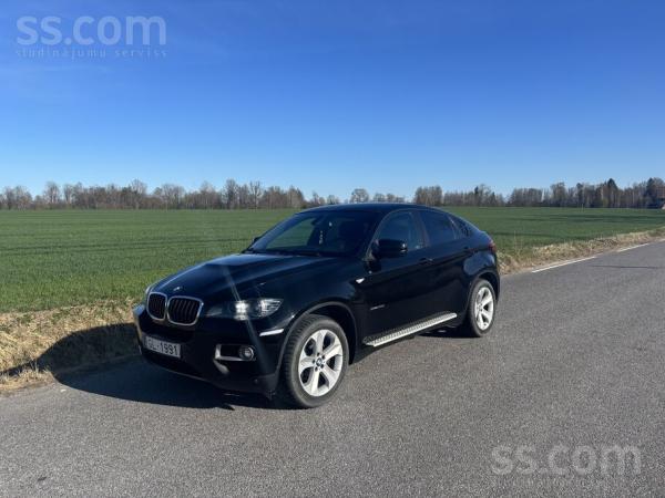 Black BMW X6 2014 in Ogre, with an engine capacity of 3.00 L and mileage of 212 thousand km for 13700 €, photo 1 on AUTOMOTO.COM.LV