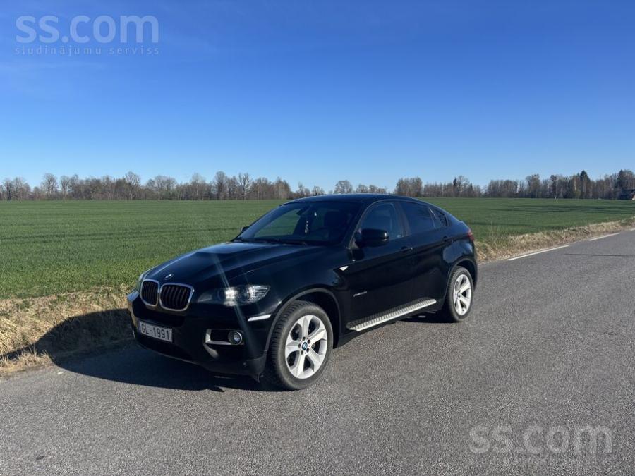 Black BMW X6 2014 in Ogre, with an engine capacity of 3.00 L and mileage of 212 thousand km for 13700 €, photo 1 on AUTOMOTO.COM.LV
