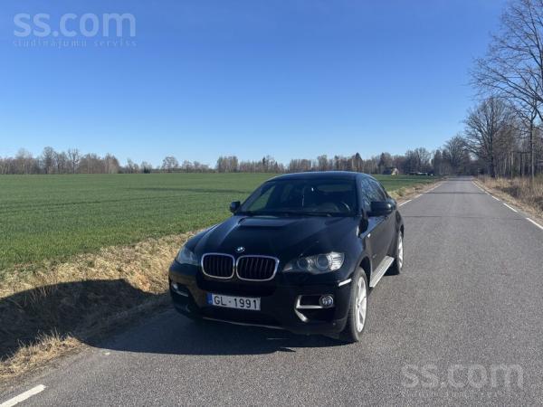 Black BMW X6 2014 in Ogre, with an engine capacity of 3.00 L and mileage of 212 thousand km for 13700 €, photo 2 on AUTOMOTO.COM.LV