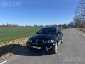 Black BMW X6 2014 in Ogre, with an engine capacity of 3.00 L and mileage of 212 thousand km for 13700 €, photo 3 on AUTOMOTO.COM.LV