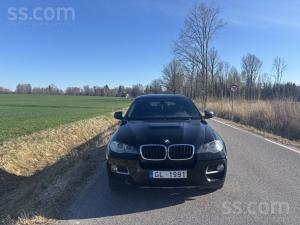 Black BMW X6 2014 in Ogre, with an engine capacity of 3.00 L and mileage of 212 thousand km for 13700 €, photo 4 on AUTOMOTO.COM.LV