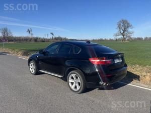 Black BMW X6 2014 in Ogre, with an engine capacity of 3.00 L and mileage of 212 thousand km for 13700 €, photo 6 on AUTOMOTO.COM.LV
