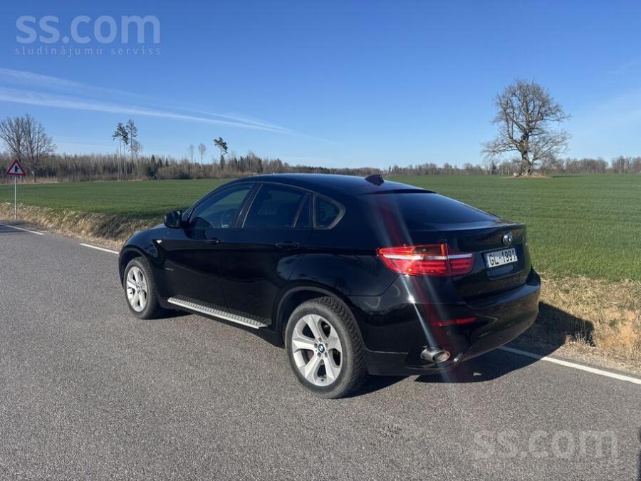 Black BMW X6 2014 in Ogre, with an engine capacity of 3.00 L and mileage of 212 thousand km for 13700 €, photo 6 on AUTOMOTO.COM.LV