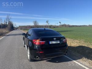 Black BMW X6 2014 in Ogre, with an engine capacity of 3.00 L and mileage of 212 thousand km for 13700 €, photo 7 on AUTOMOTO.COM.LV
