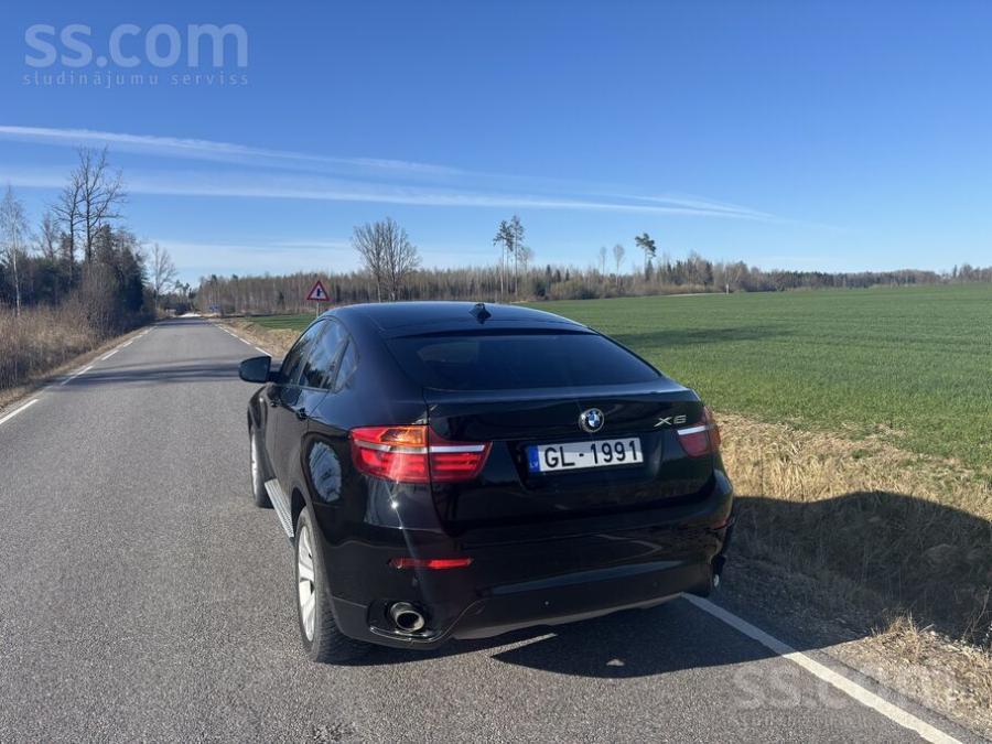 Black BMW X6 2014 in Ogre, with an engine capacity of 3.00 L and mileage of 212 thousand km for 13700 €, photo 7 on AUTOMOTO.COM.LV