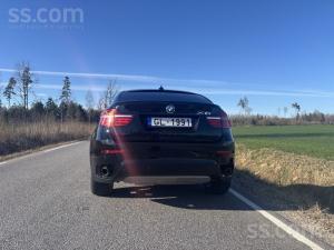 Black BMW X6 2014 in Ogre, with an engine capacity of 3.00 L and mileage of 212 thousand km for 13700 €, photo 8 on AUTOMOTO.COM.LV