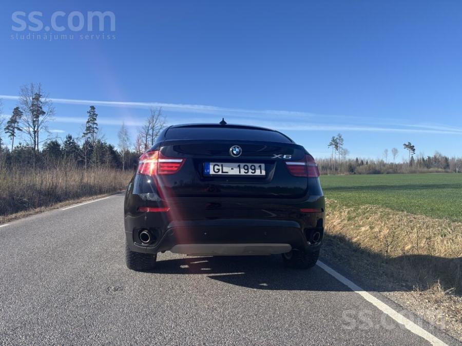 Black BMW X6 2014 in Ogre, with an engine capacity of 3.00 L and mileage of 212 thousand km for 13700 €, photo 8 on AUTOMOTO.COM.LV