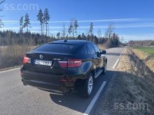 Black BMW X6 2014 in Ogre, with an engine capacity of 3.00 L and mileage of 212 thousand km for 13700 €, photo 9 on AUTOMOTO.COM.LV