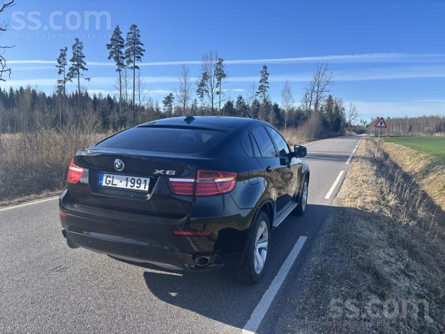 Black BMW X6 2014 in Ogre, with an engine capacity of 3.00 L and mileage of 212 thousand km for 13700 €, photo 9 on AUTOMOTO.COM.LV