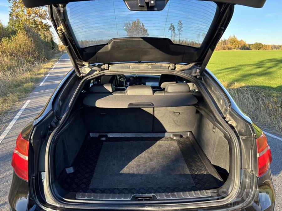 Black BMW X6 2014 in Ogre, with an engine capacity of 3.00 L and mileage of 212 thousand km for 13700 €, photo 10 on AUTOMOTO.COM.LV